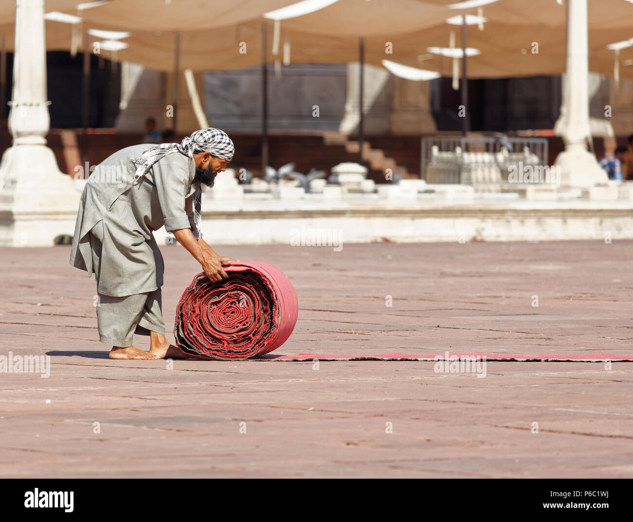 Unrolling red carpet hi-res stock photography and images - Alamy