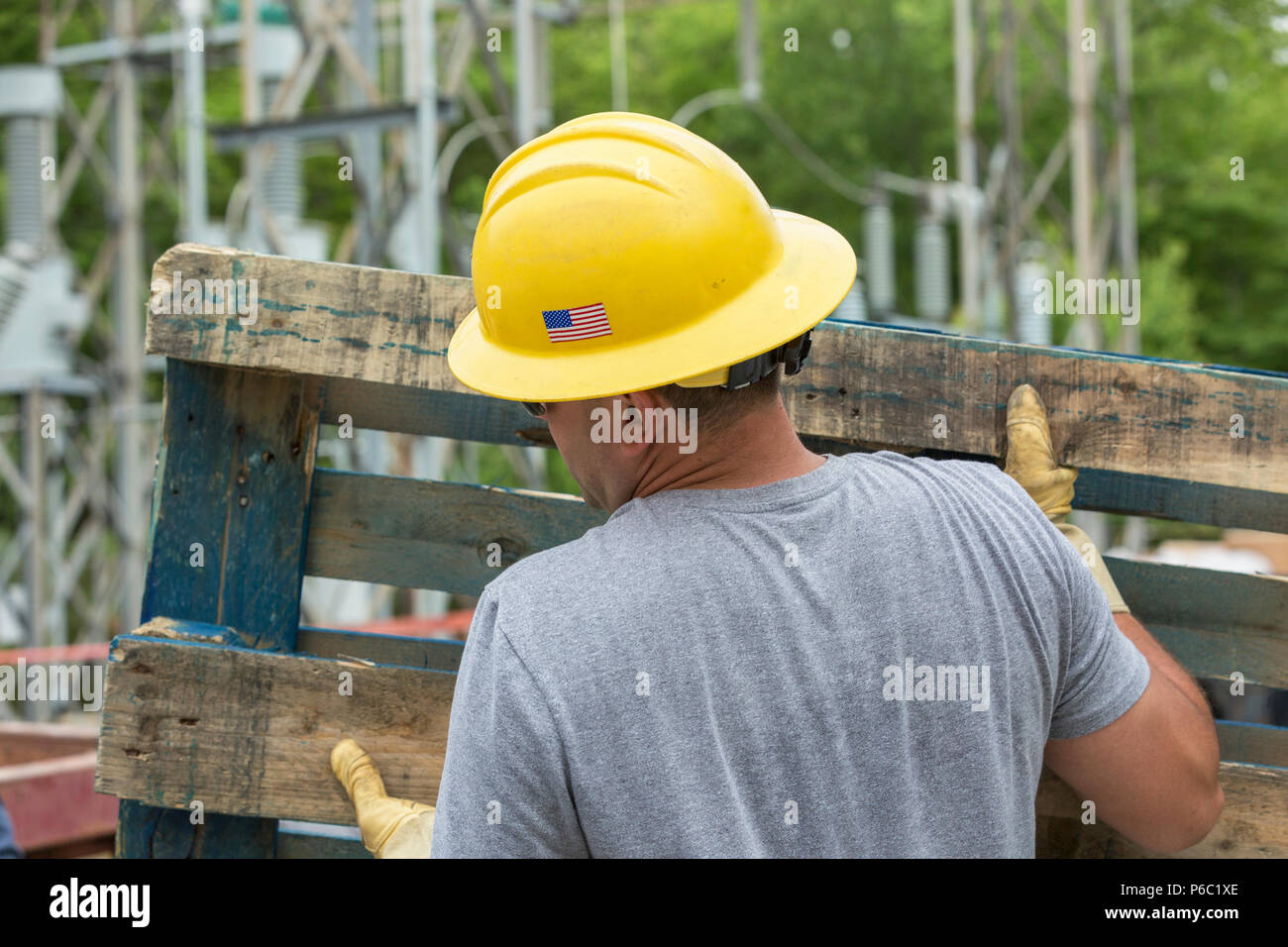 Engineer moving pallet Stock Photo - Alamy