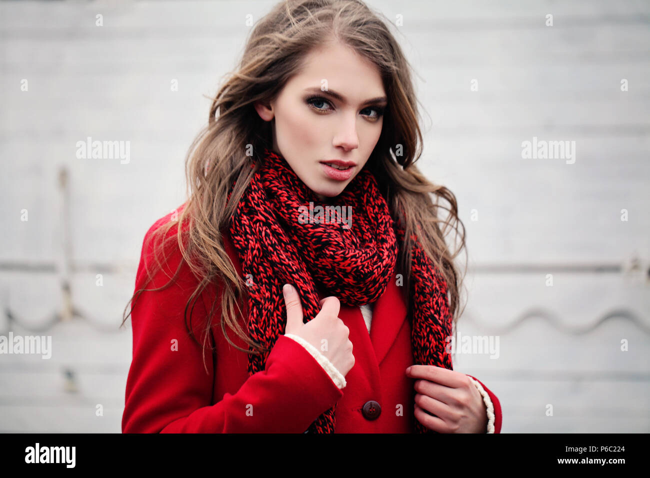 Woman with red scarf hi-res stock photography and images - Alamy