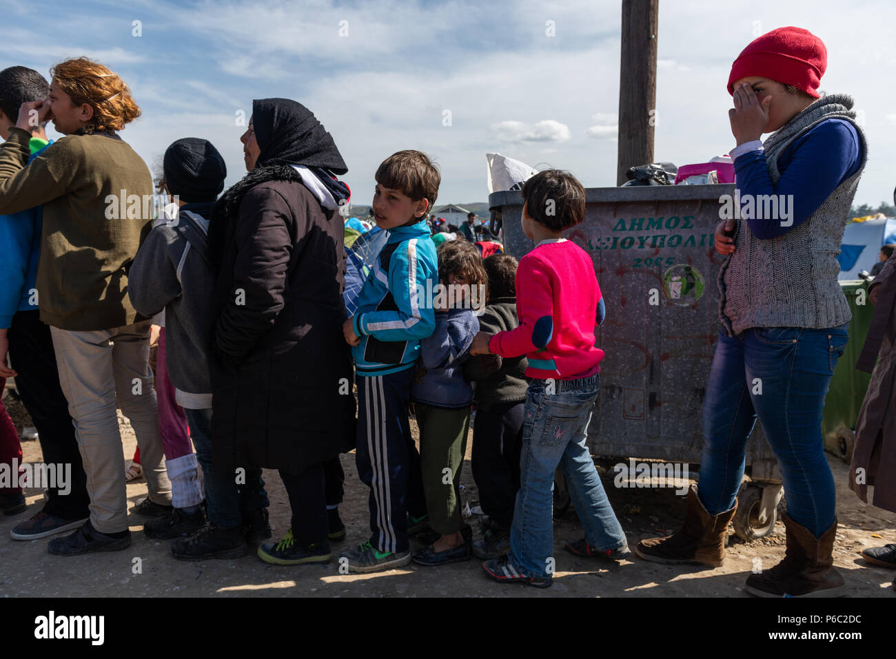 Children food distribution queue hi-res stock photography and images ...