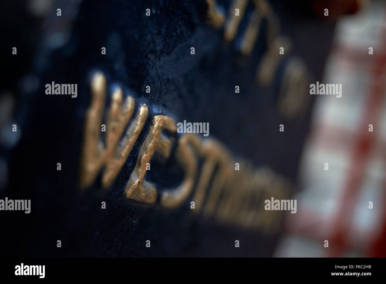 Close up of the word Westminster engraved on the lamp posts in the city ...