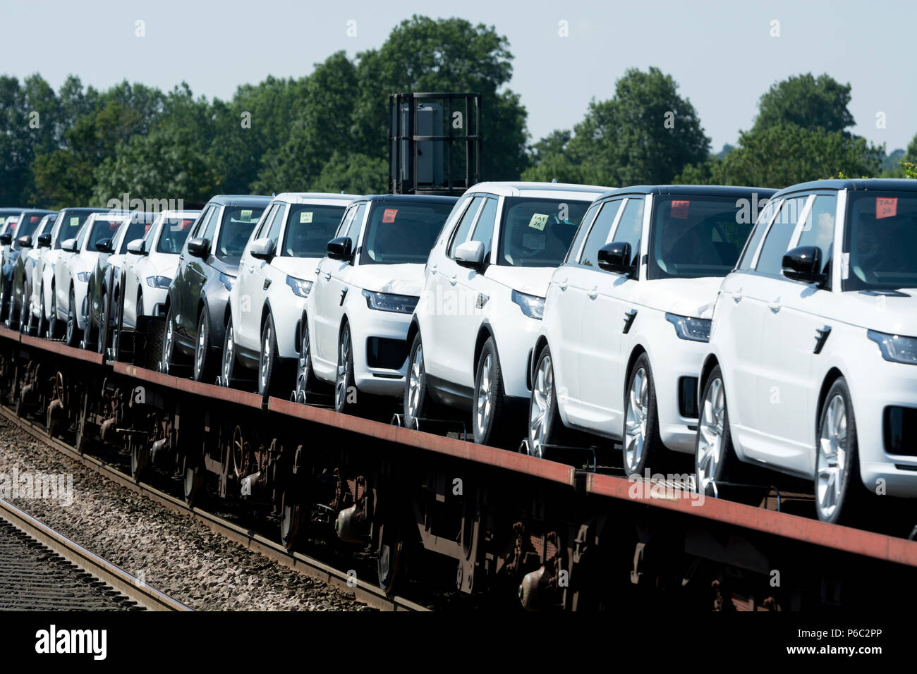 New Land Rover cars transported by rail, Warwickshire, UK Stock Photo ...