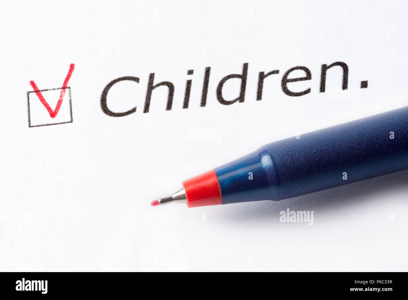 The word children is printed on a white background. Check mark in red ...