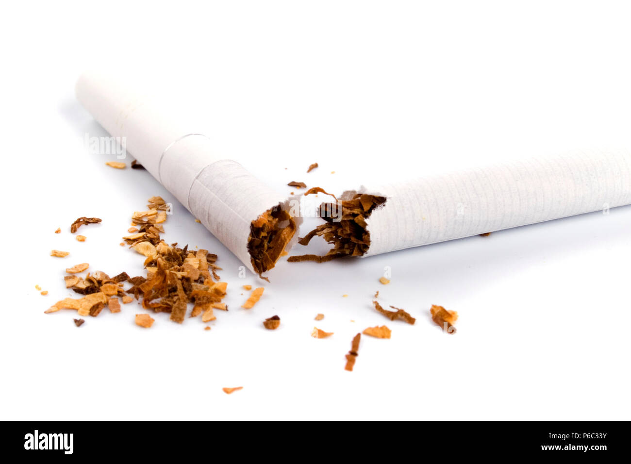 broken cigarette on white backgrounnd Stock Photo - Alamy