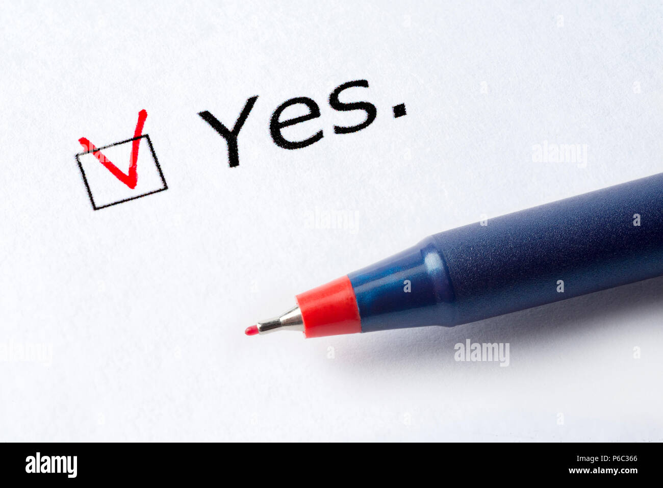 The word Yes is printed on a white background. Check mark in red ...