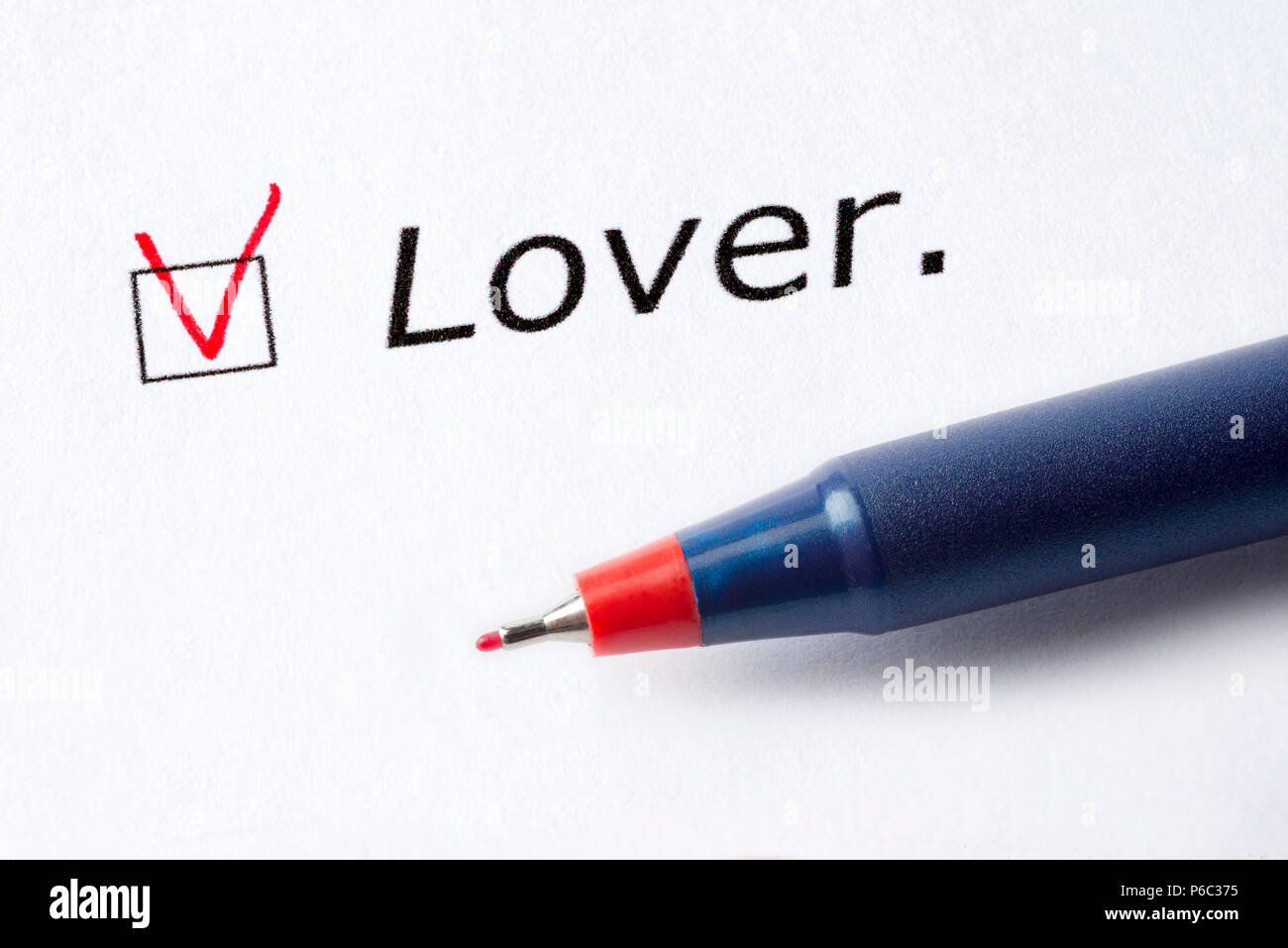 The word lover is printed on a white background. Check mark in red ...