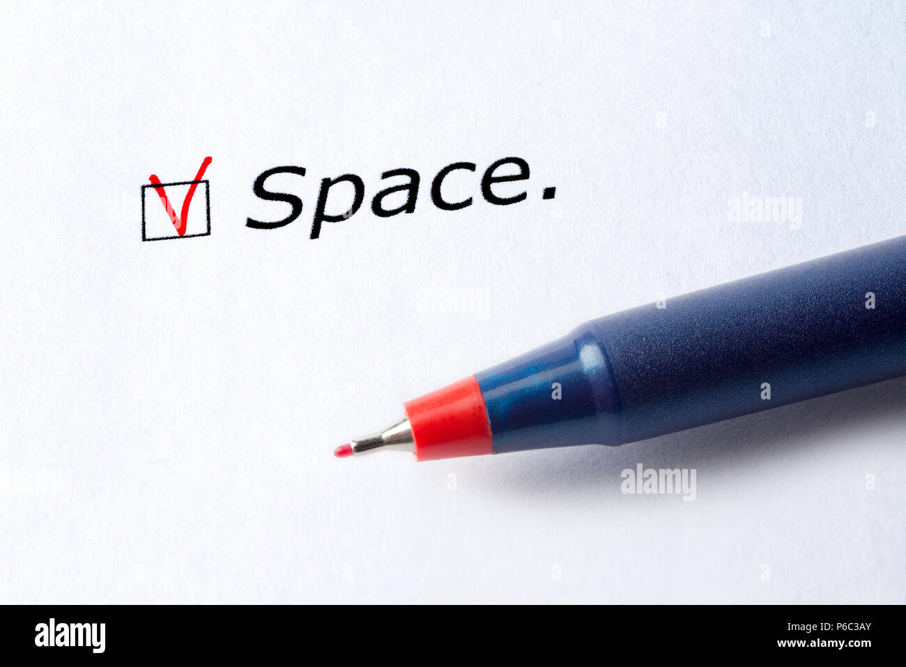 The word space is printed on a white background. Check mark in red ...