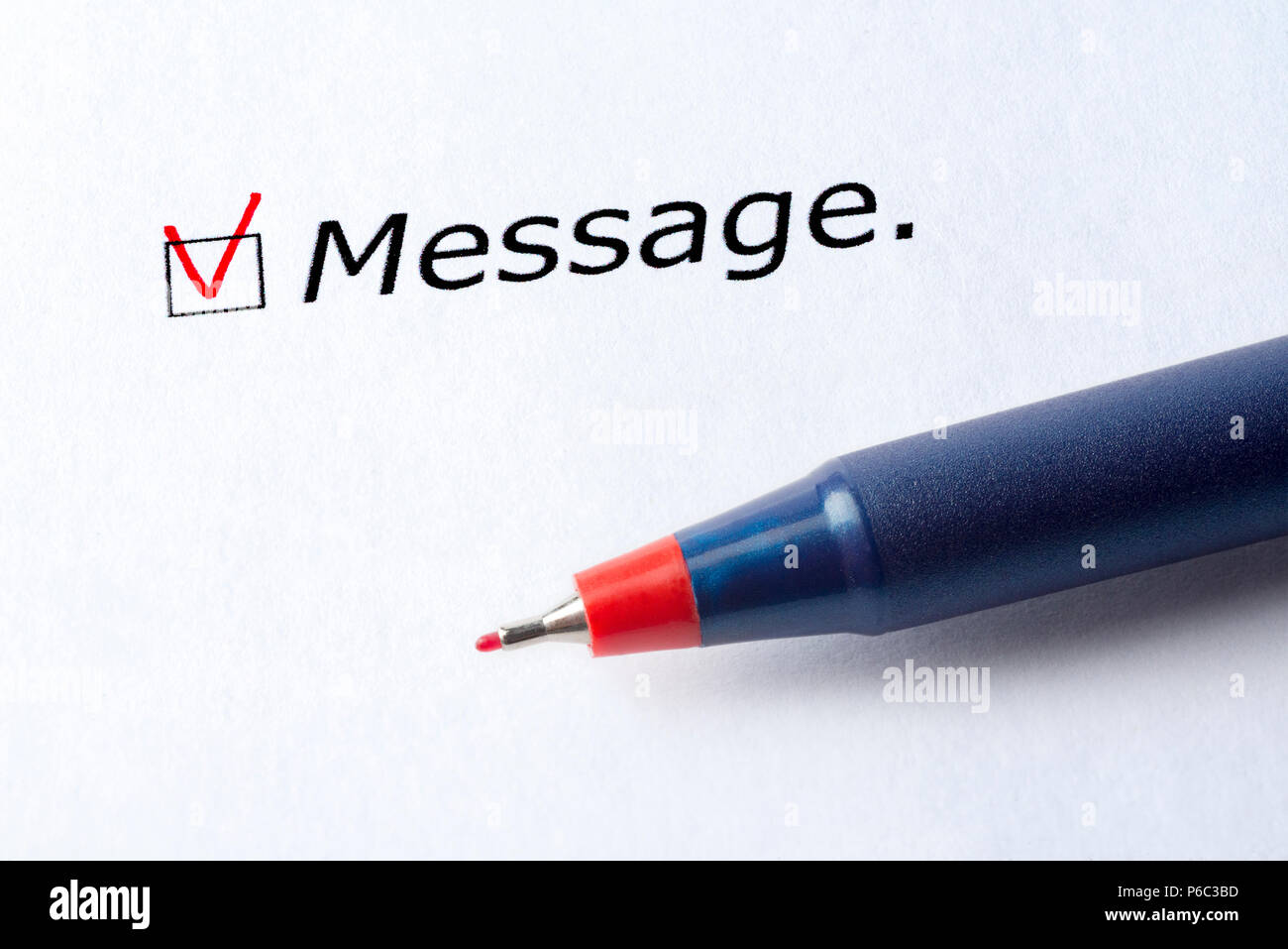 Word message printed on white background. Check mark in red, marked in ...