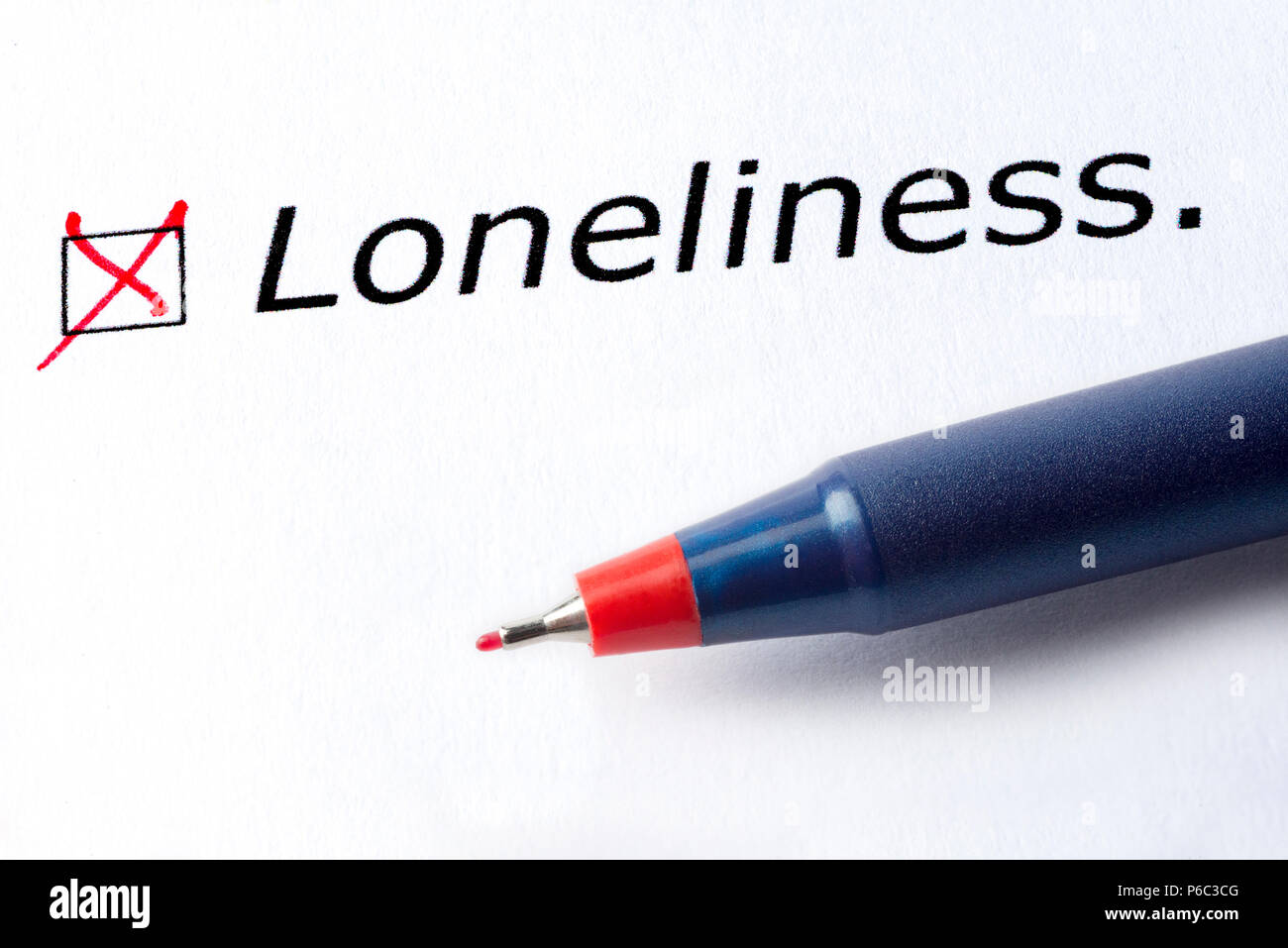 The word loneliness is printed on a white background. Check mark in red ...