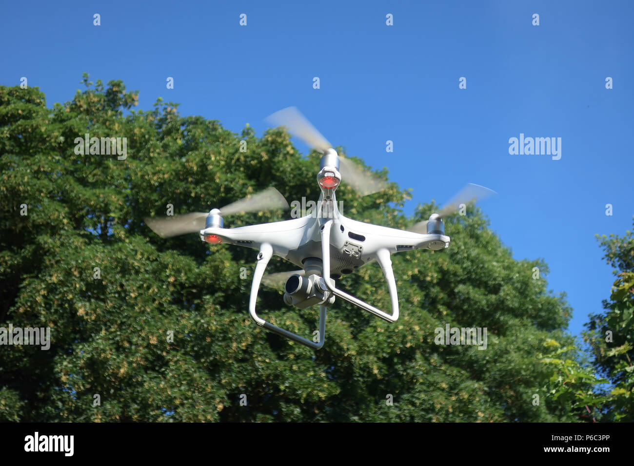 Drone in flight Stock Photo - Alamy
