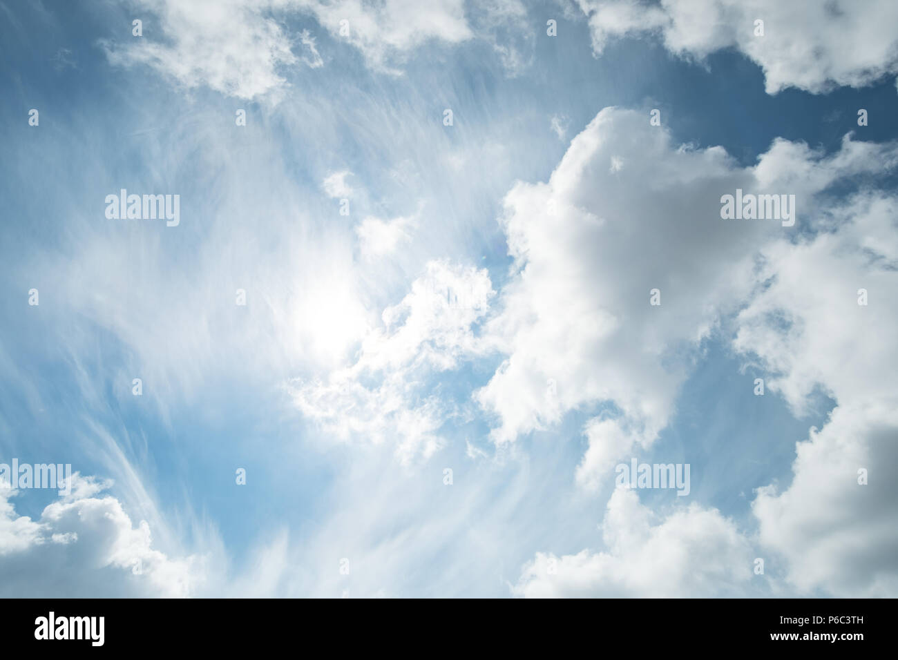 Blue sky with fluffy cloud, natural background Stock Photo - Alamy