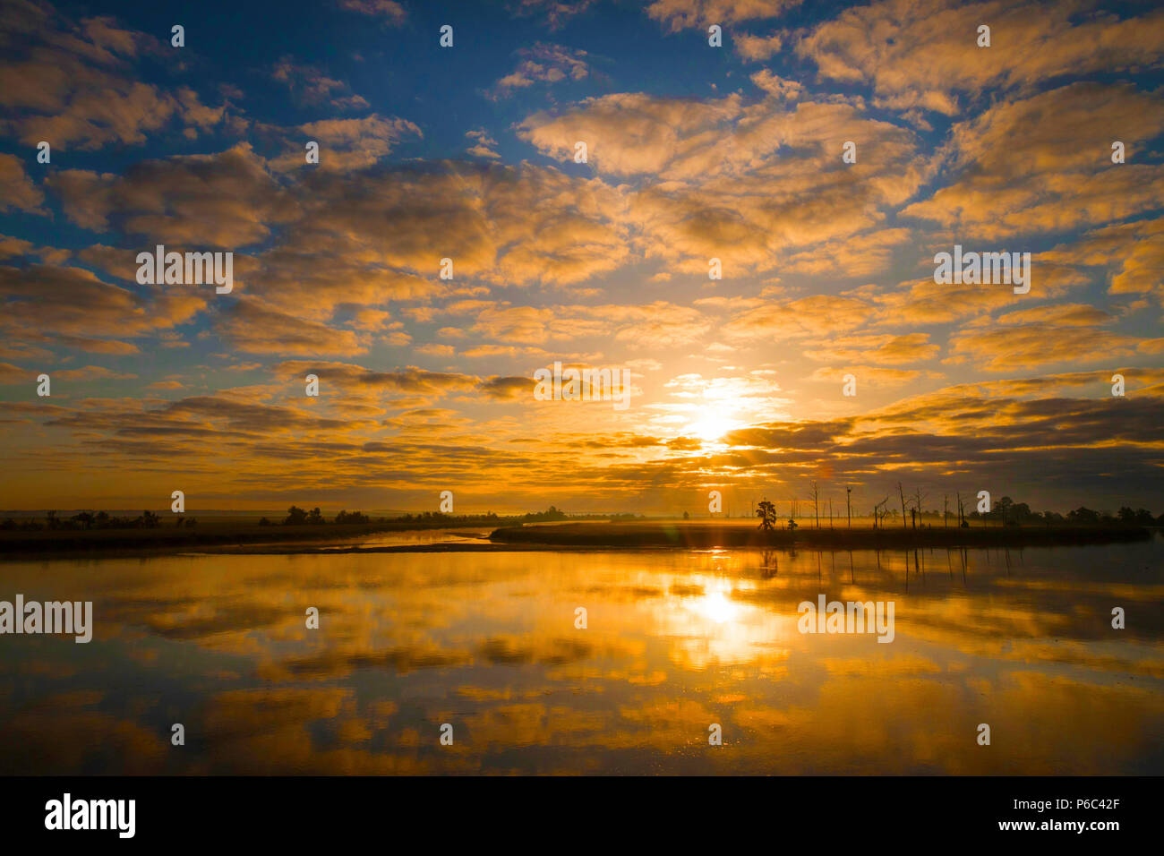 A sunraise over the water in southeast Georgia Stock Photo - Alamy
