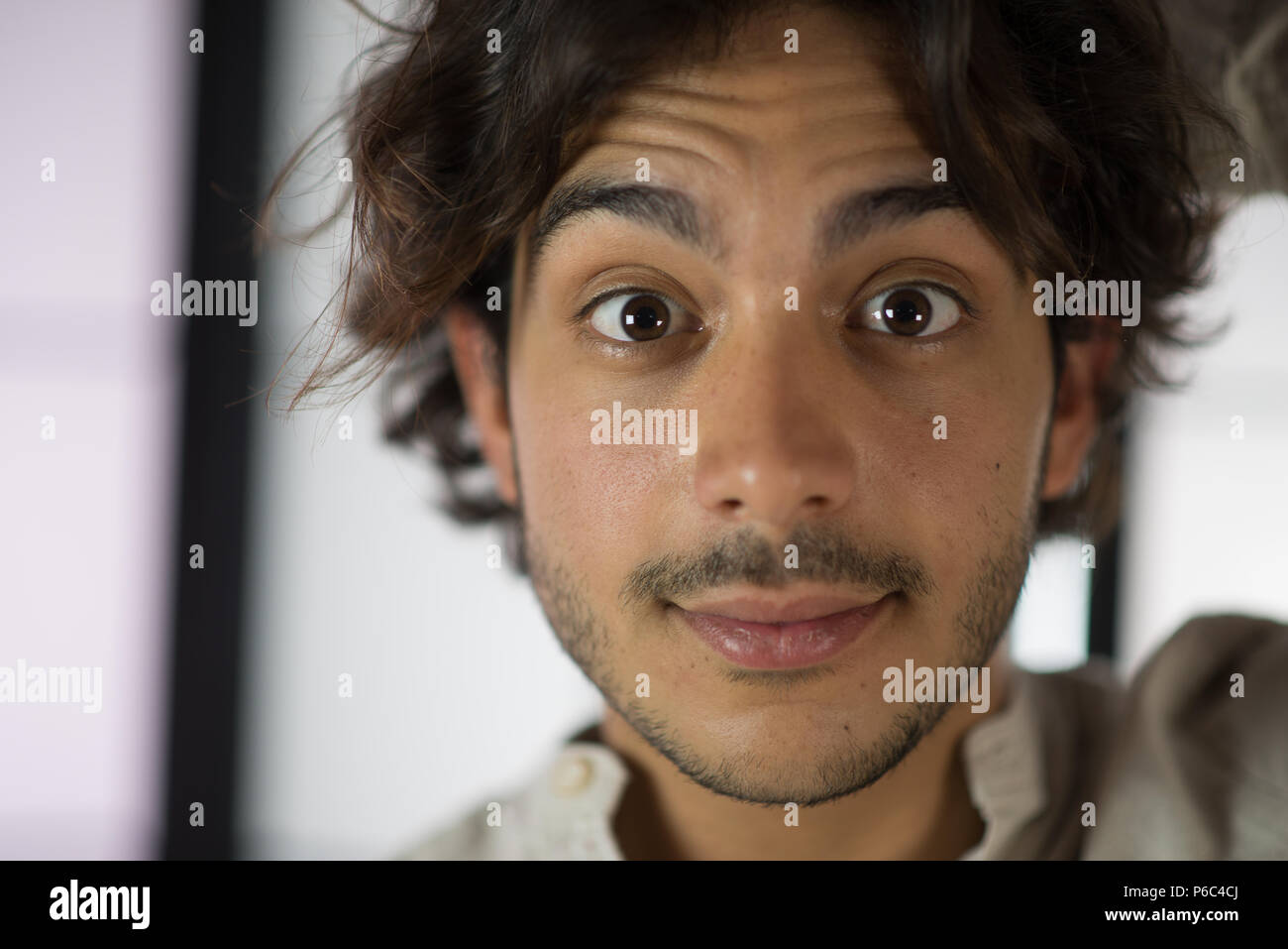 Brown eyes young man close hi-res stock photography and images - Alamy