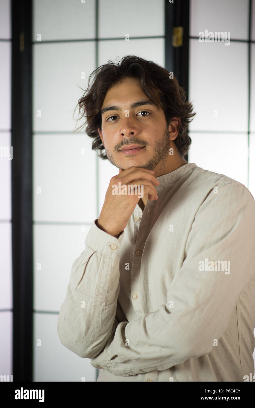 Close Up of Young Man Touching His Chin Stock Photo - Alamy