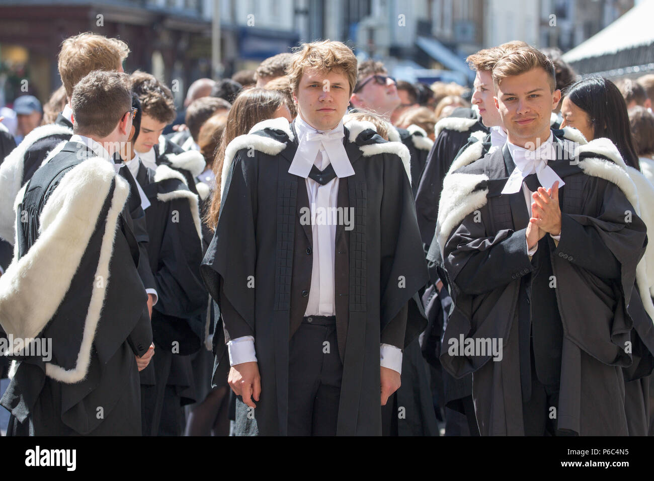 Students from Cambridge University on their way to the Senate House to ...