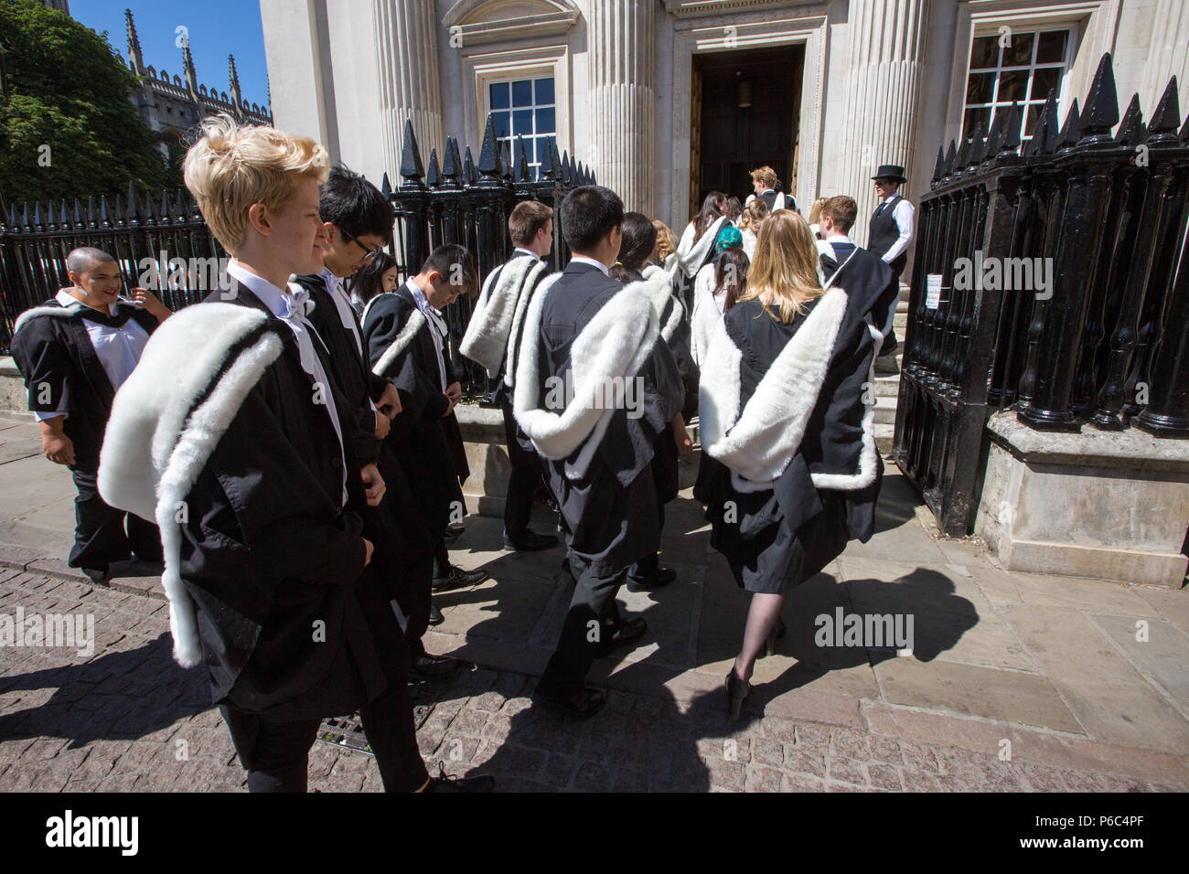 Students from Cambridge University on their way to the Senate House to ...