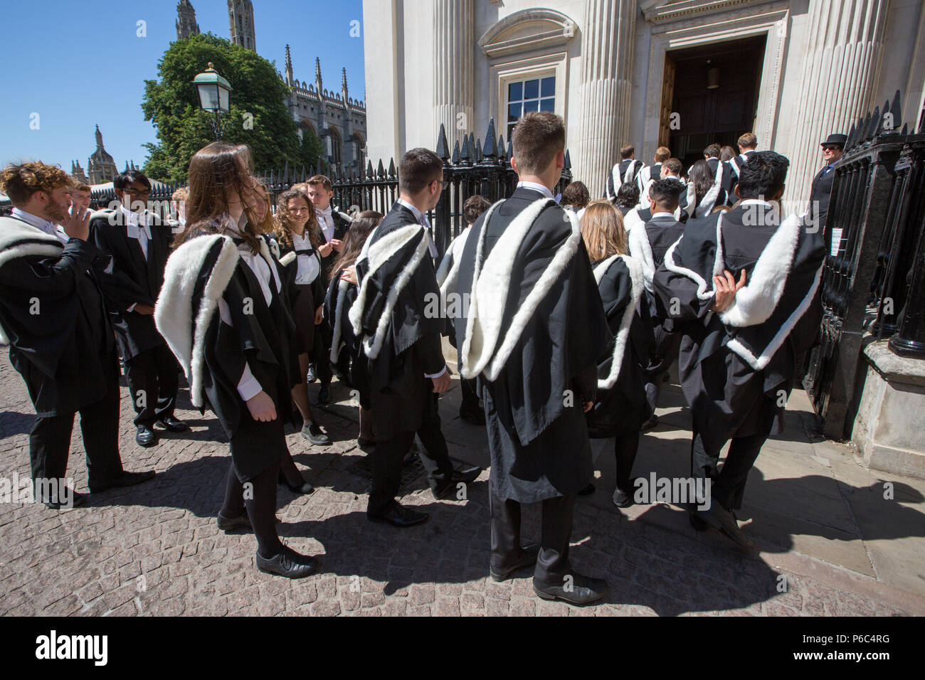 Students from Cambridge University on their way to the Senate House to ...