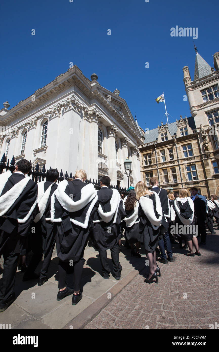 Students from Cambridge University on their way to the Senate House to ...