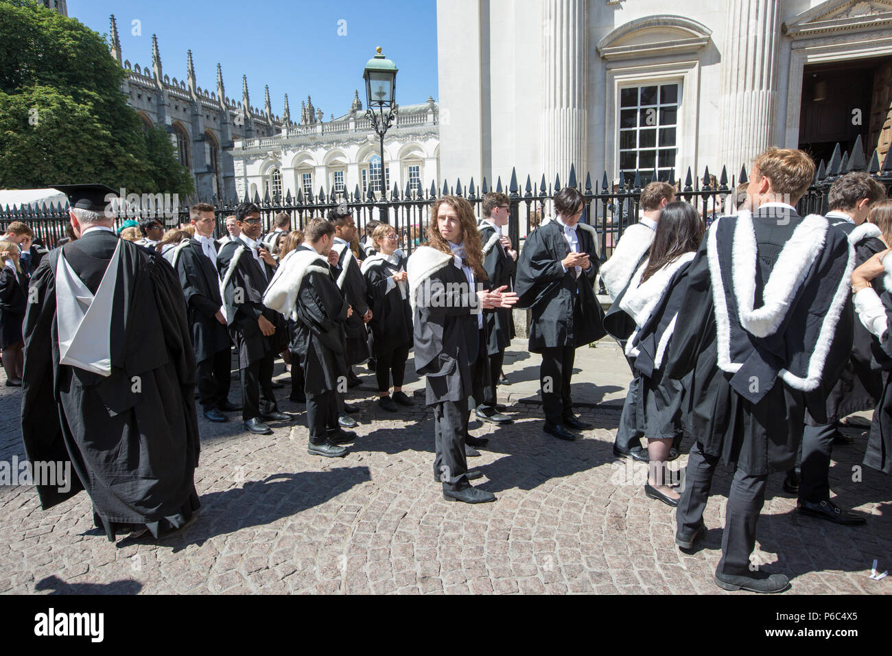 Students from Cambridge University on their way to the Senate House to ...