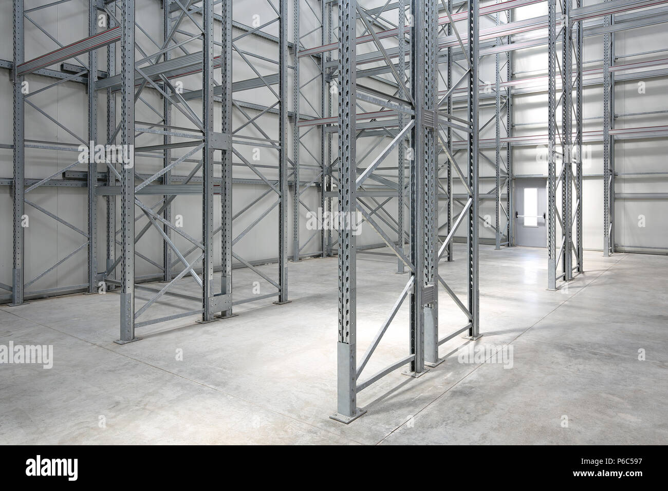 Empty Shelves in New Distribution Warehouse Stock Photo - Alamy