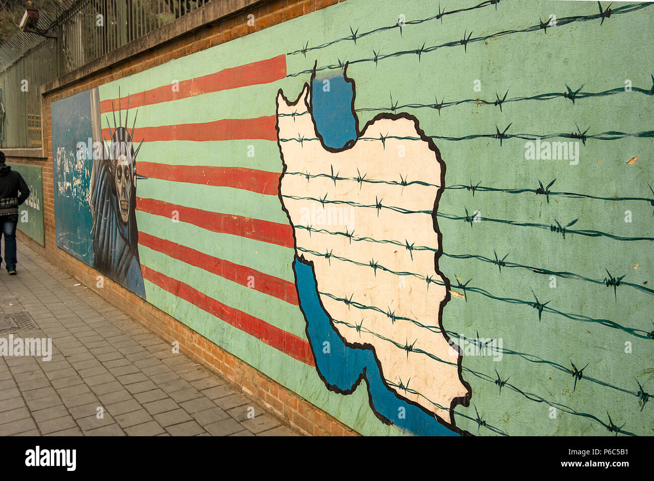 Anti-American paintings on the parameter wall of the ex US embassy in ...