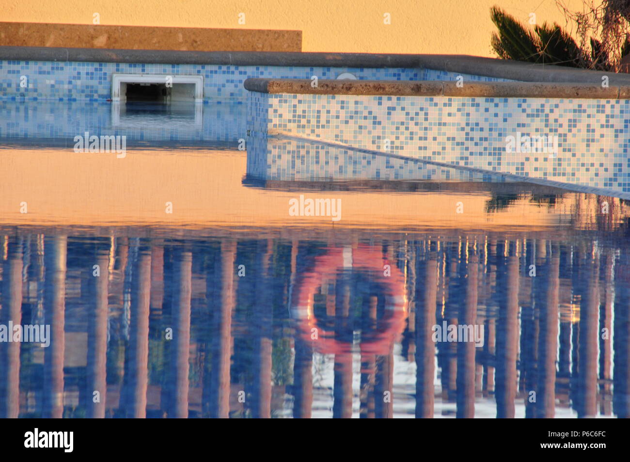 pool mirrored and reflected in its water Stock Photo - Alamy