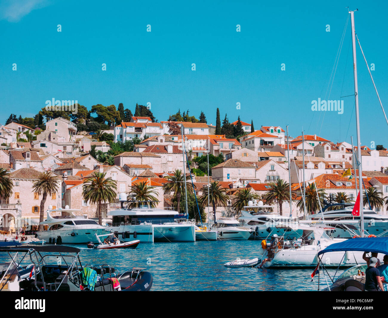 Ships and boats are moored in the port of Hvar Island Stock Photo - Alamy
