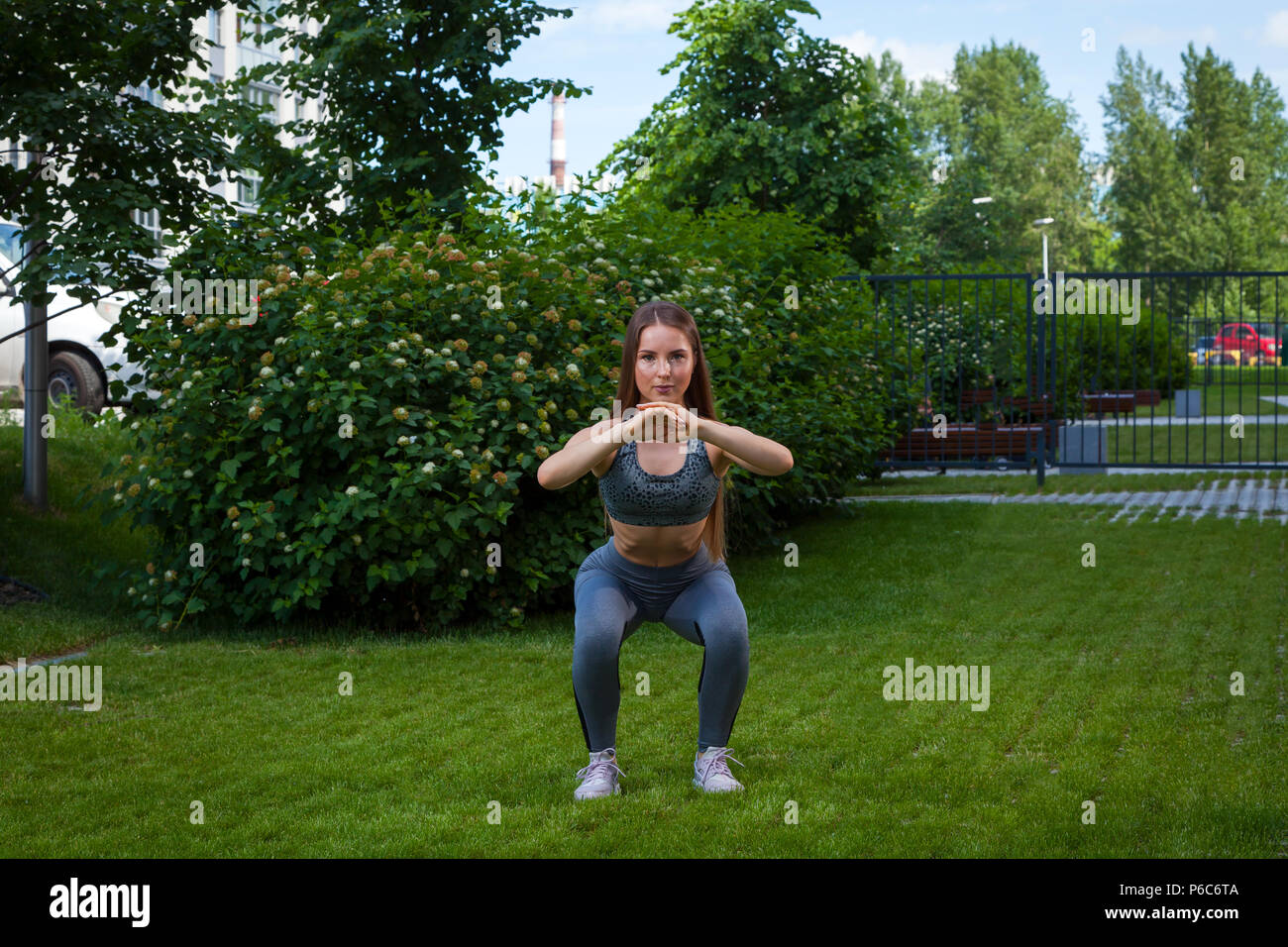 In A Squatting Position High Resolution Stock Photography and Images ...
