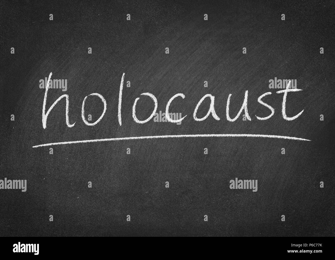 holocaust concept word on a blackboard background Stock Photo - Alamy