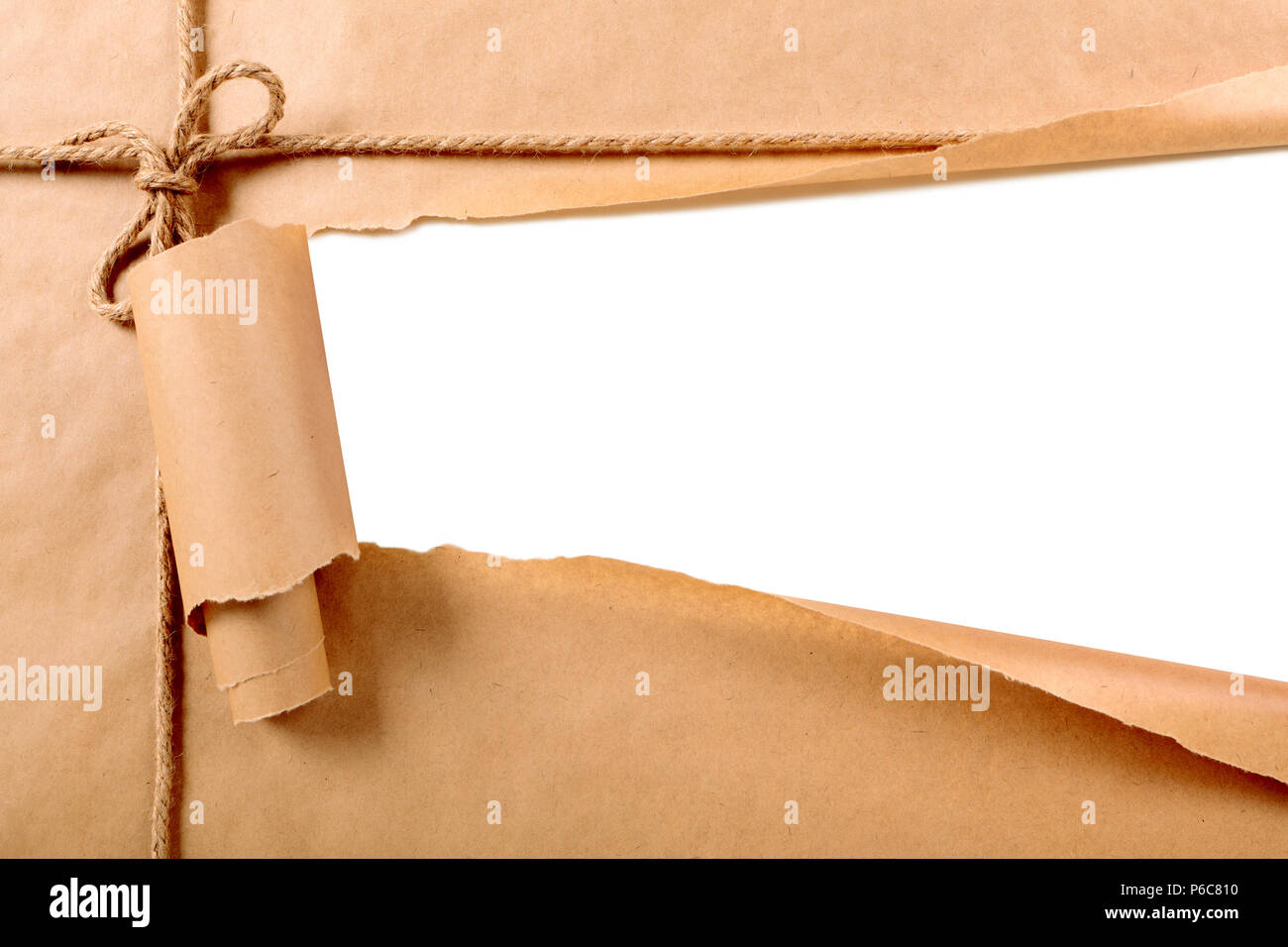 Torn paper package Stock Photo - Alamy