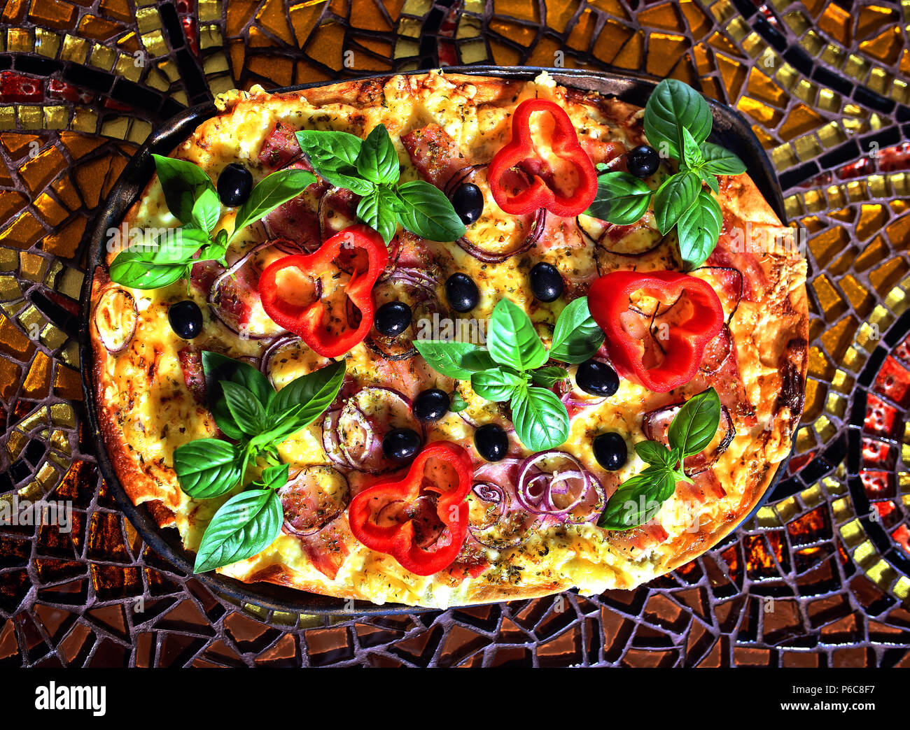 Alsatian cake with olives pepper and bacon Stock Photo - Alamy