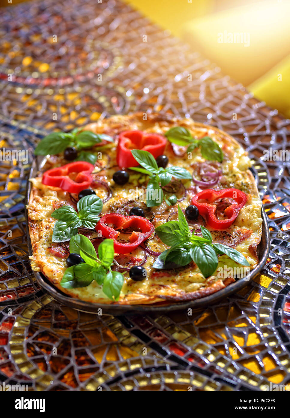 Alsatian cake with olives pepper and bacon Stock Photo - Alamy