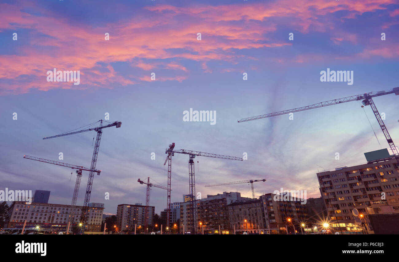 Construction site and cranes in the city skyline Stock Photo - Alamy