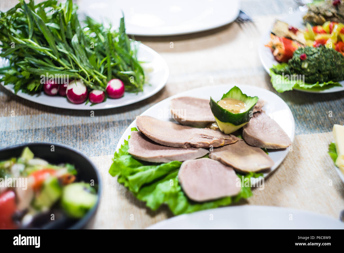 Traditional georgian table serving supra with greens and salads Stock ...