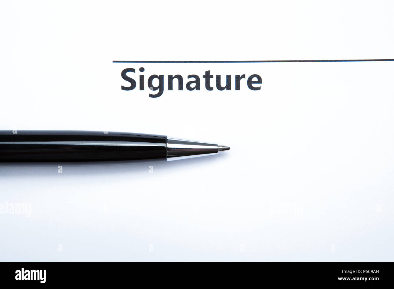 pen and signature on a white closeup Stock Photo - Alamy