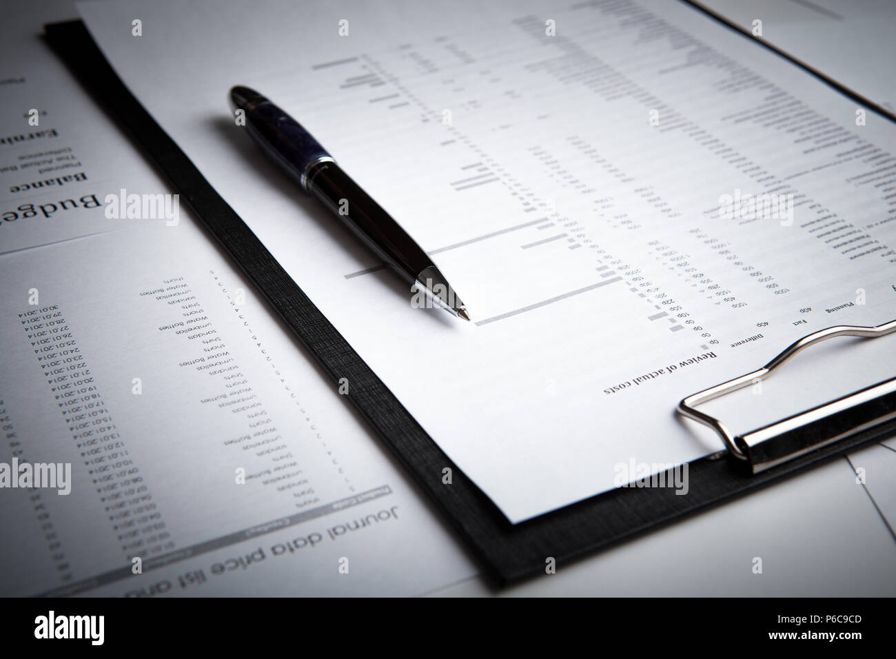 pen lying on the document folder Stock Photo - Alamy