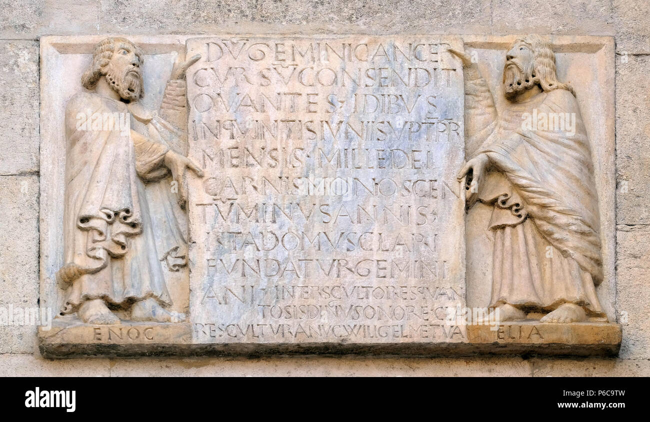 The prophets Enoch and Elijah hold the epigraph with the foundation ...