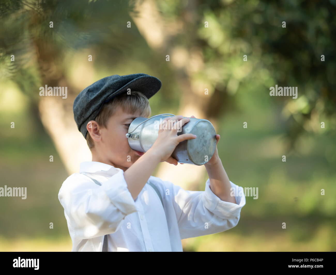 Boy can of drink hi-res stock photography and images - Alamy