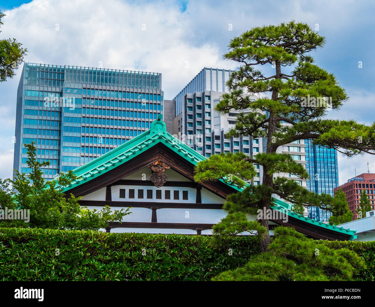 Contrast in the city - Old Japanese buildings near modern architecture ...