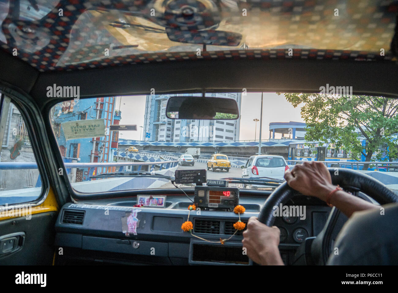 Inside a yellow Ambassador taxi – Kolkata, India Stock Photo - Alamy