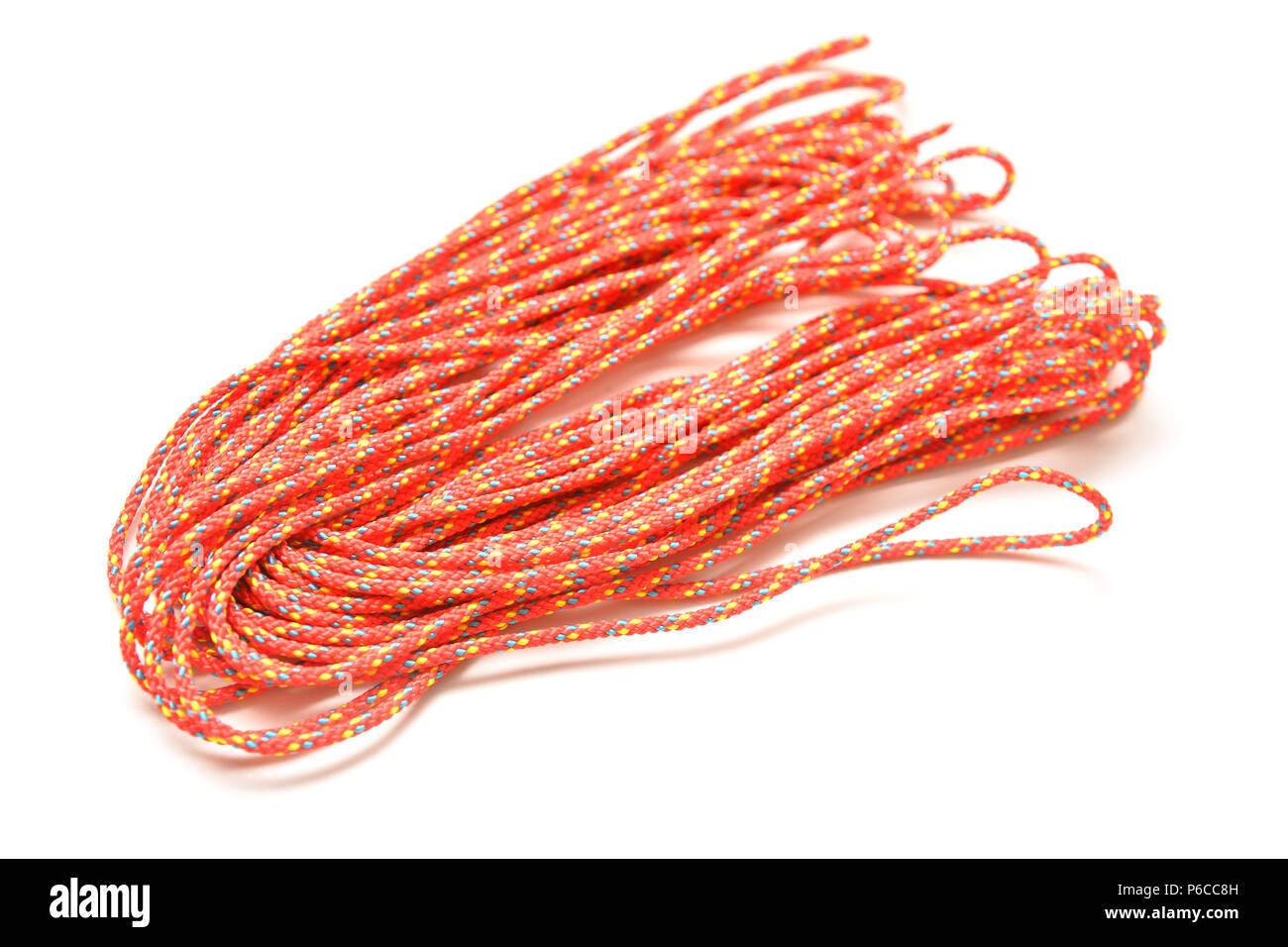 thin red rope isolated on white Stock Photo - Alamy
