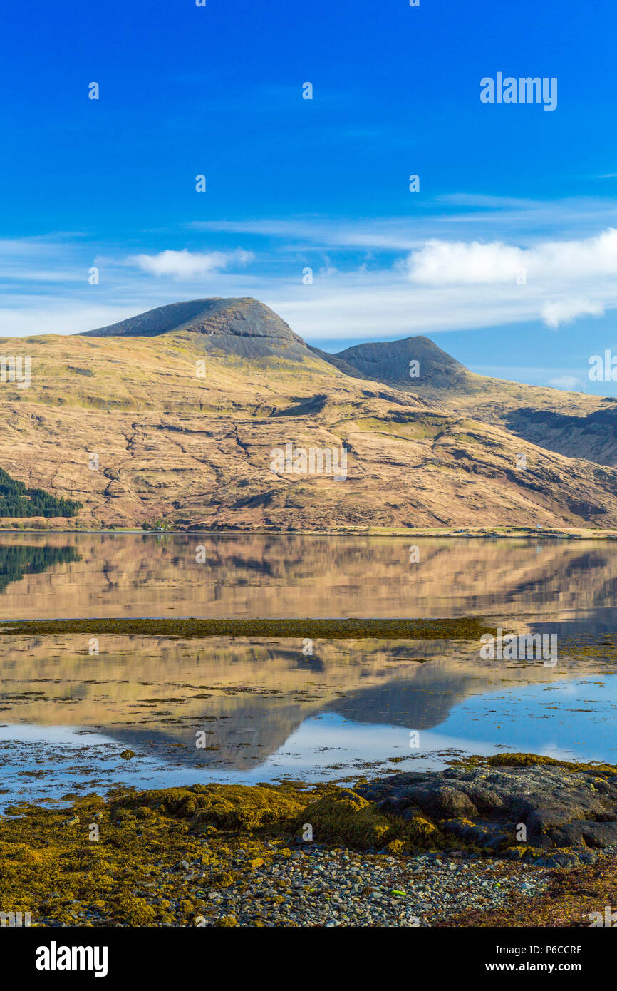 Early morning reflections of Ben More and A'Chioch in the still waters ...