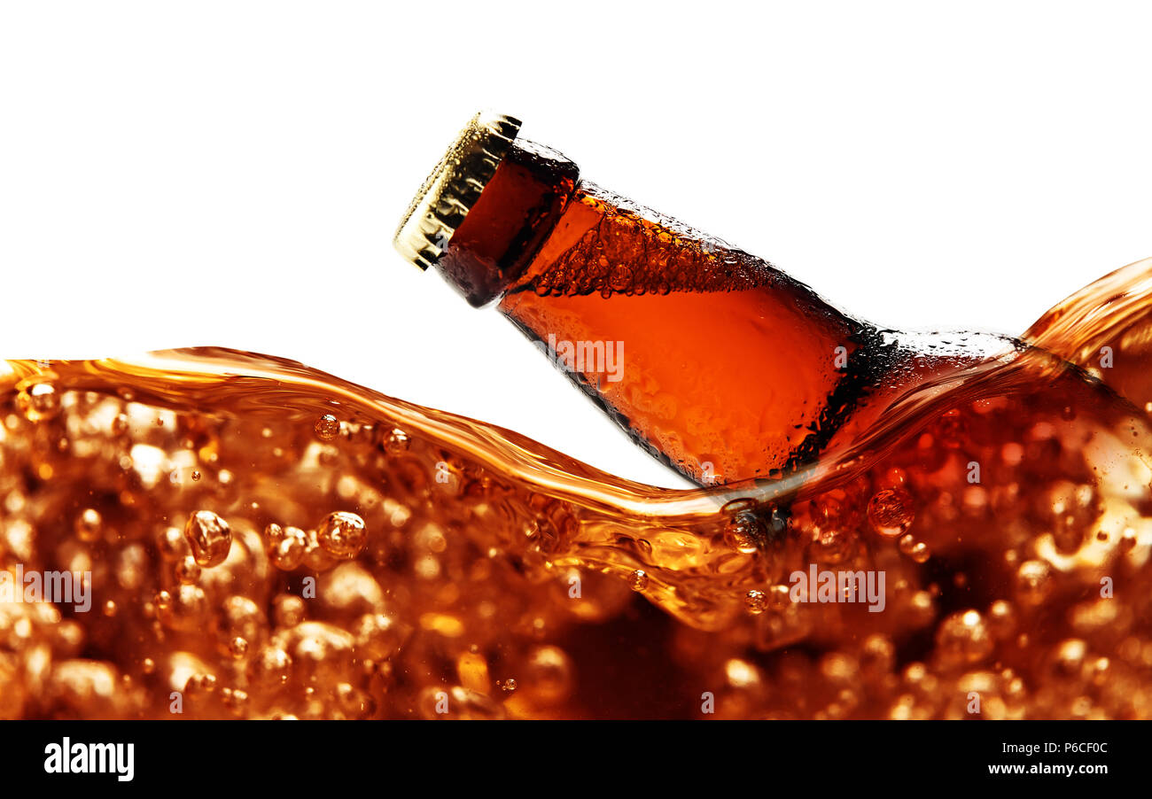 Wet beer bottle isolated on a white background Stock Photo - Alamy
