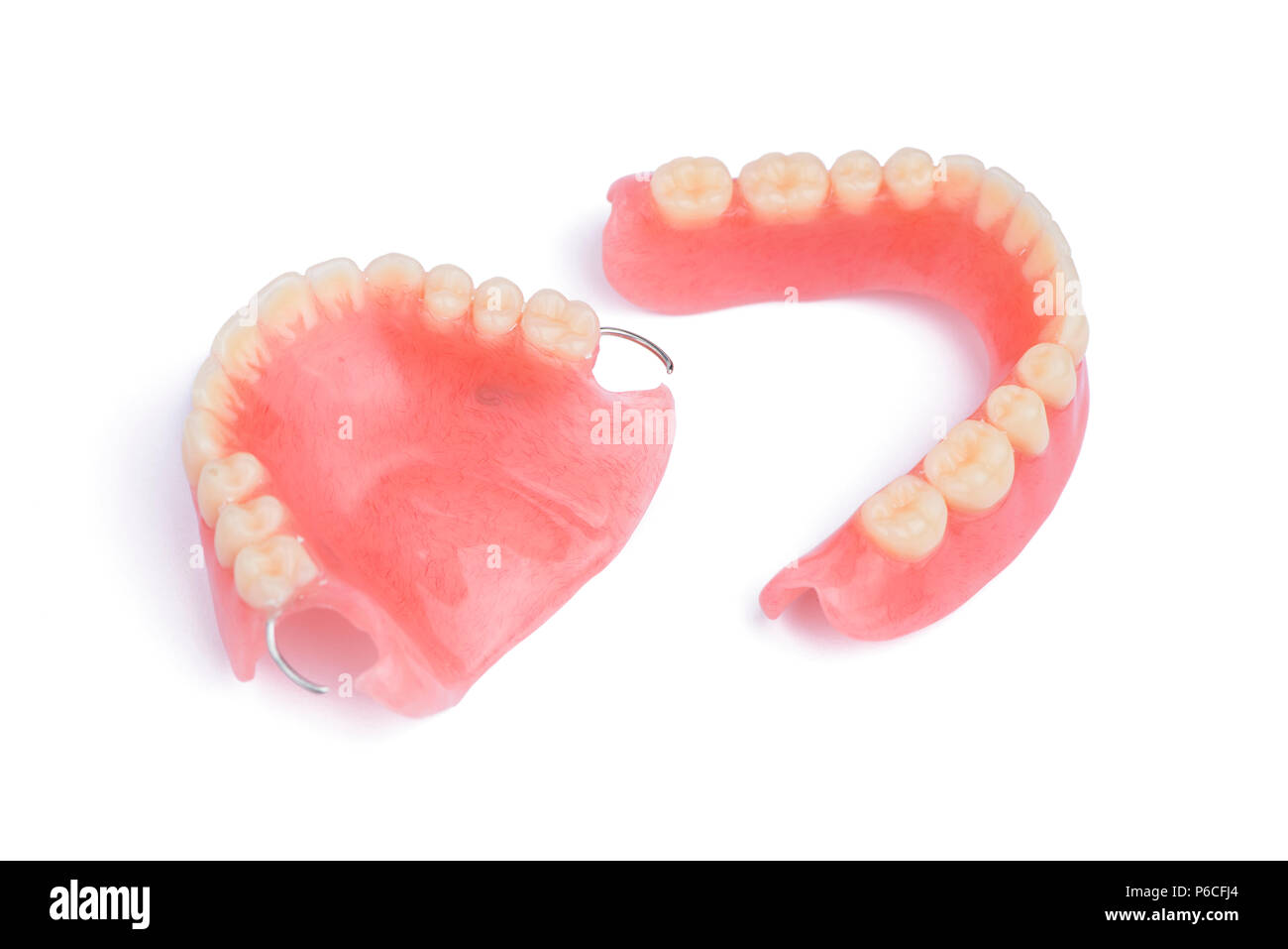 Complete set of false teeth. Isolated on white background Stock Photo ...