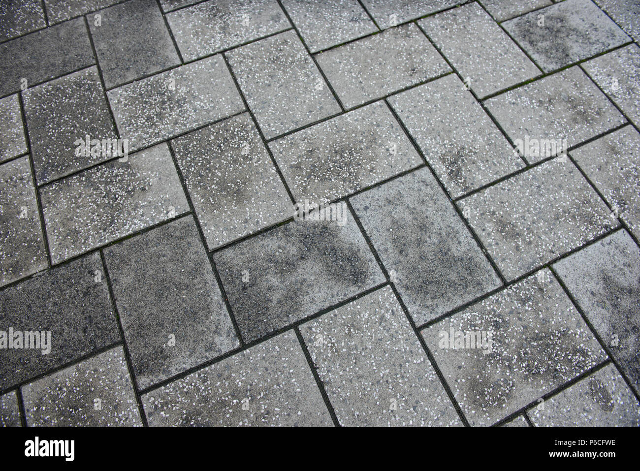 Concrete tiled pavement background Stock Photo - Alamy