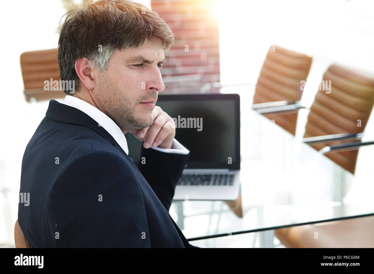 Boss sitting in the workplace before the meeting Stock Photo - Alamy