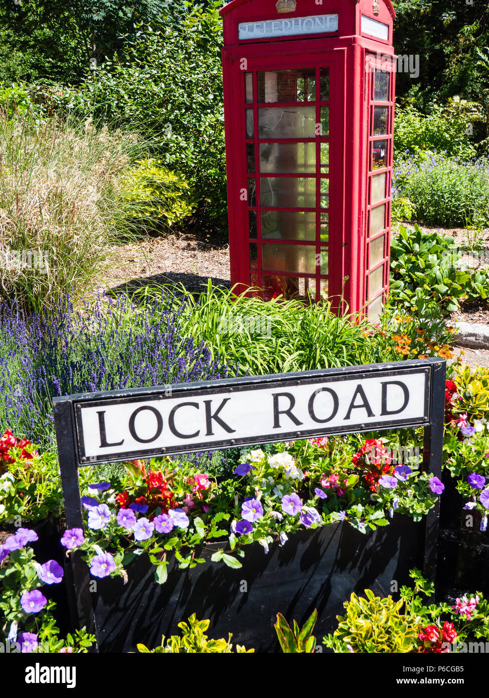 Lock Road Sign, with Flowers, and Red Telephone Box, Marlow ...