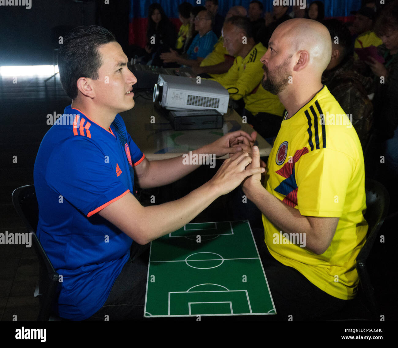 Cesar(L) is an interpreter of Sign languages and Jose Richard(R) is the ...