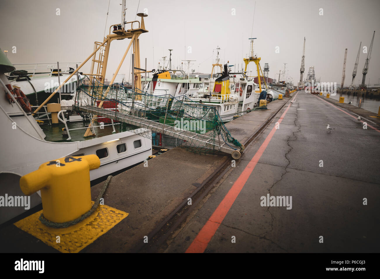 Cargo ships moored in the dockyards Stock Photo - Alamy