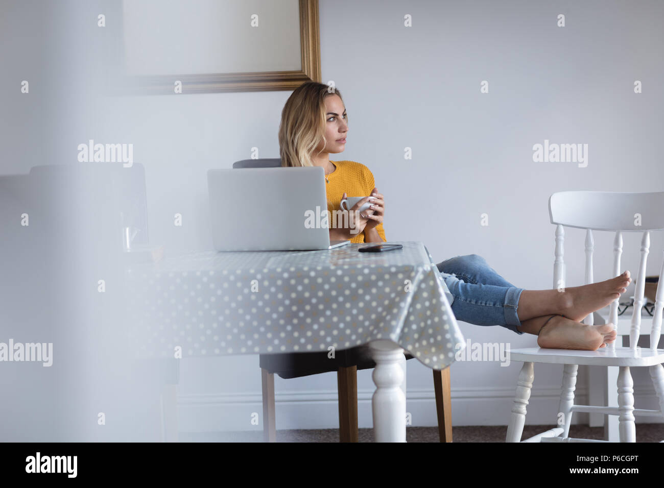 Woman feet up chair hi-res stock photography and images - Alamy